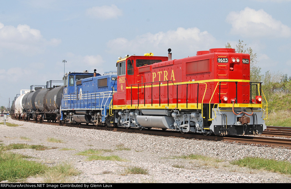 PTRA 9603 and 9617 shove a train into their North Yard